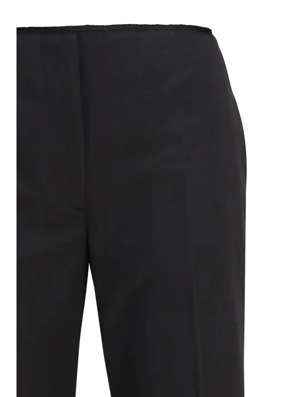 TOTEME Kick Flare Raw-edge Pants