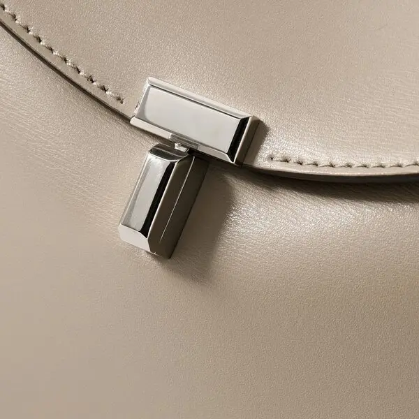 TOTEME T-lock Leather Clutch Bag