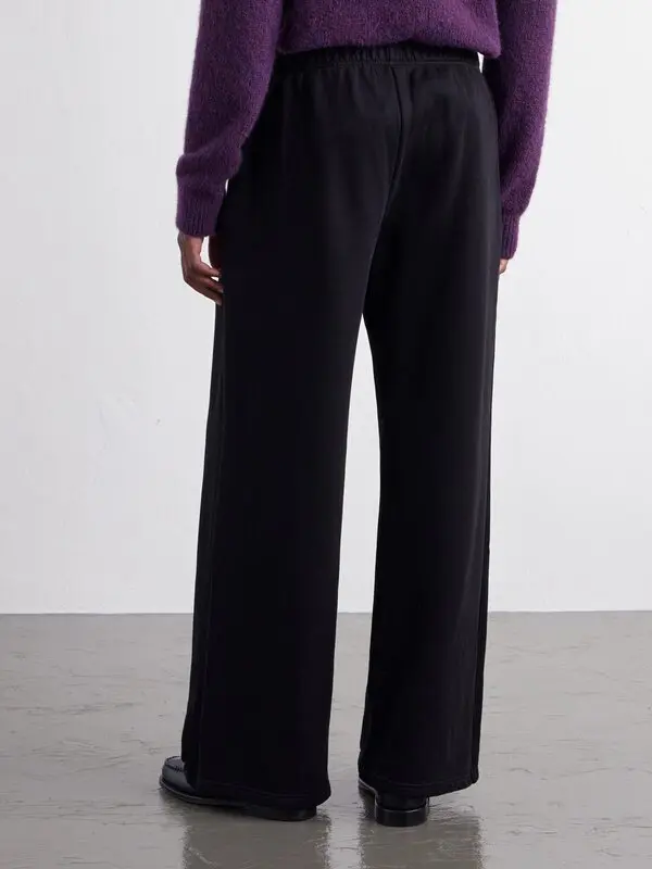 LES TIEN Party Wide-leg Garment-dyed Cotton-fleece Sweatpants - Black