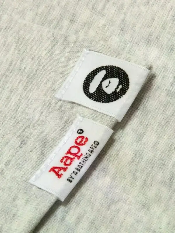 AAPE BY *A BATHING APE Aapeunvs Moonface Graphic T-shirt