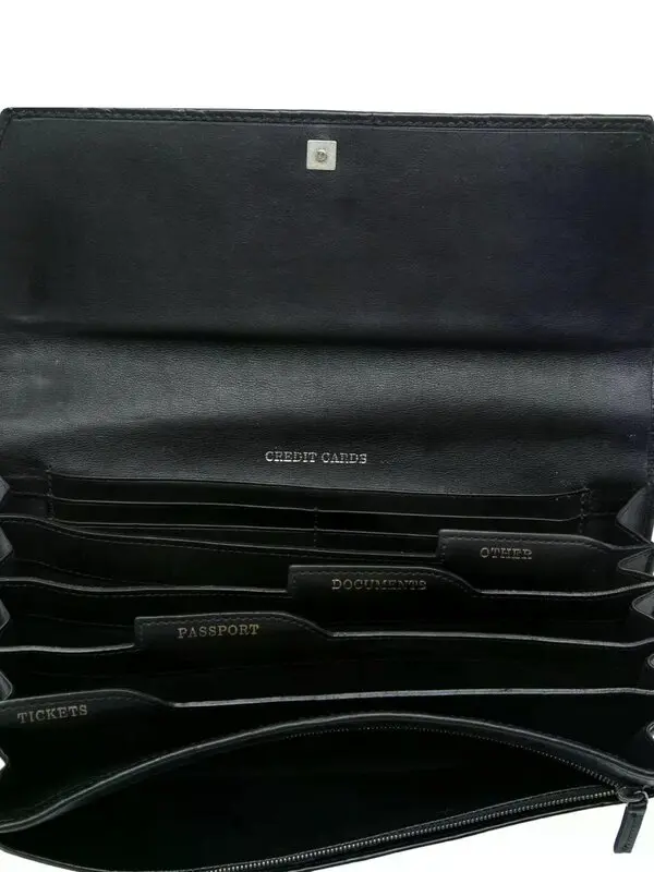 Gucci Monogram Embossed Leather Clutch