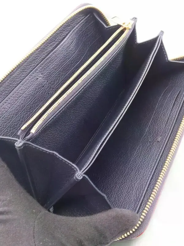 LOUIS VUITTON 2017 Monogram Empreinte Zippy Wallet