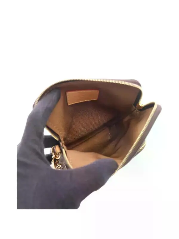 LOUIS VUITTON Utility Monogram Handbag