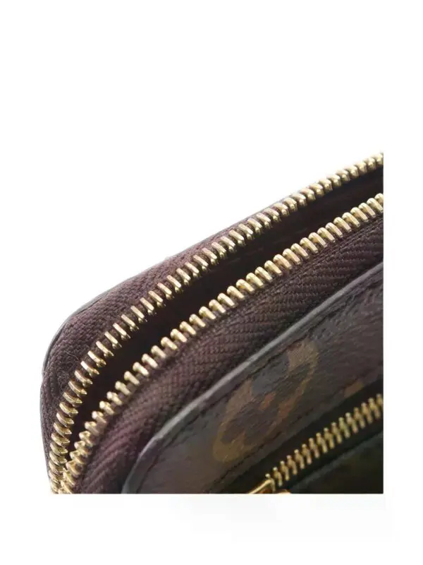 LOUIS VUITTON Utility Monogram Handbag