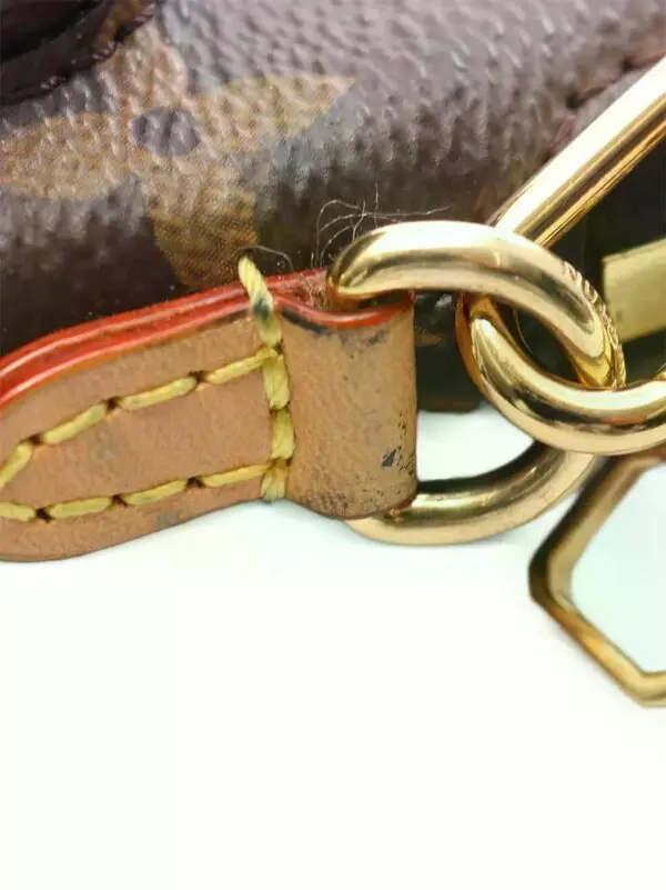 LOUIS VUITTON Utility Monogram Handbag