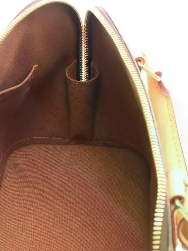 LOUIS VUITTON Monogram Alma Handbag