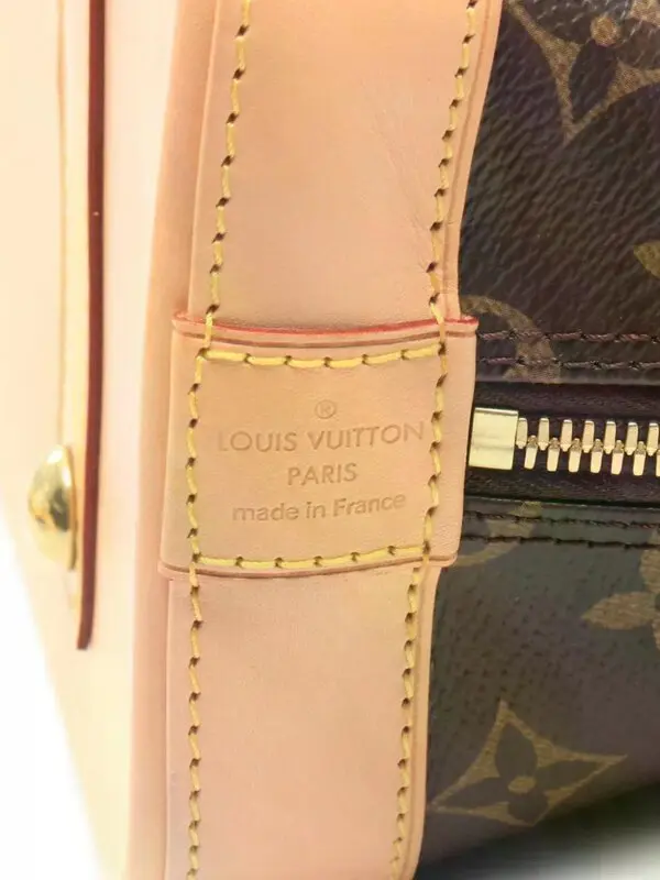LOUIS VUITTON Monogram Alma Handbag
