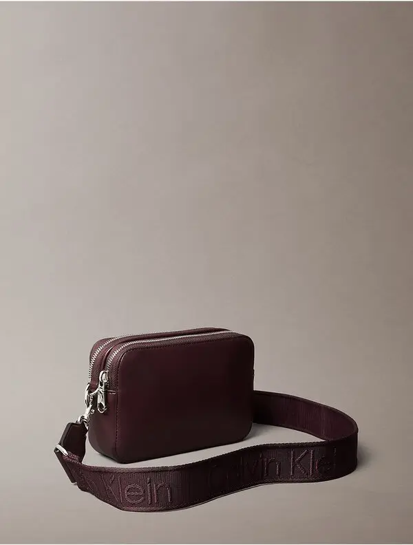 Calvin Klein Embossed Logo Crossbody Bag - Fudge