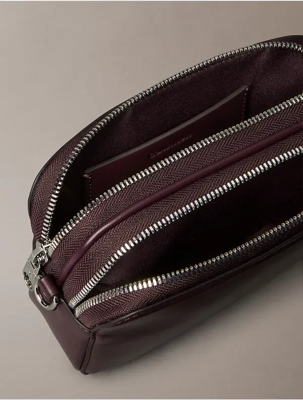 Calvin Klein Embossed Logo Crossbody Bag - Fudge