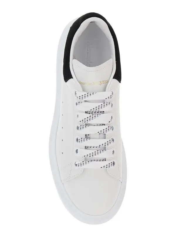 Alexander McQueen Black And Low Top Sneakers With Logo Lettering On The Tongue And Contrasting Heel With Logo Lettering In Leather - White