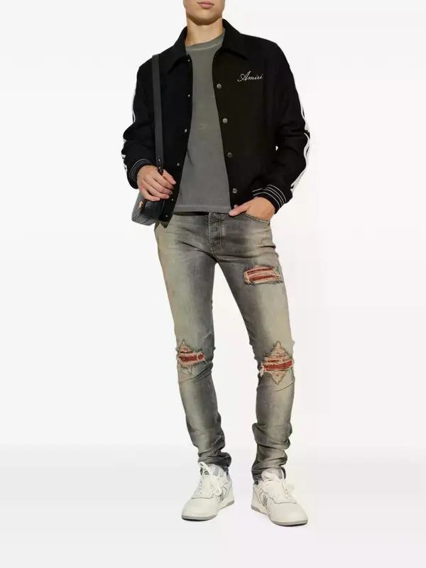 Amiri Distressed Patchwork Jeans