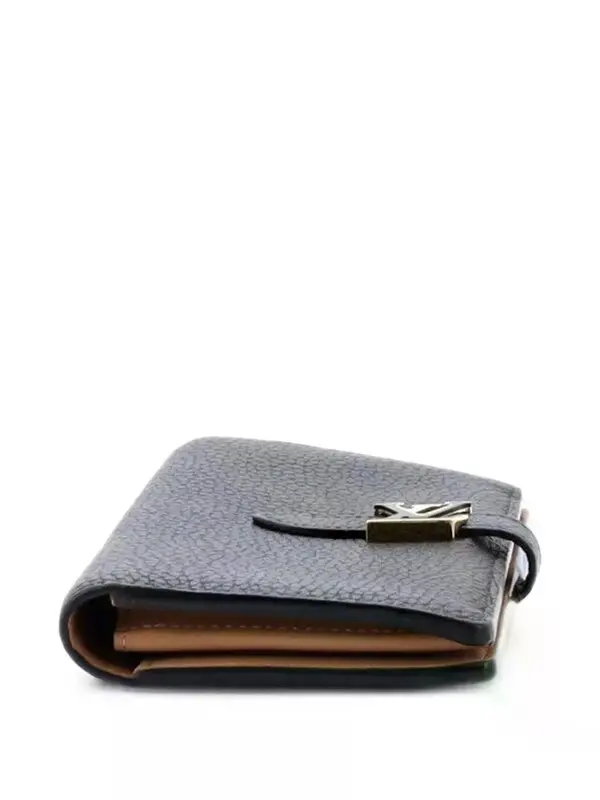 LOUIS VUITTON Capucines Vertical Wallet Leather Small Wallets