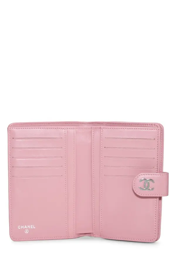 Chanel Embossed Camellia Zip Around Wallet
