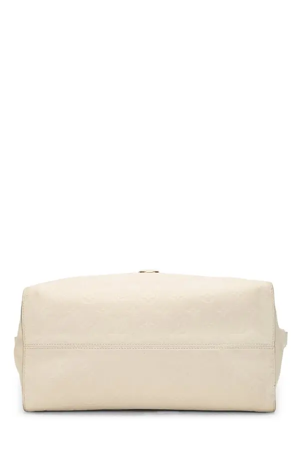 LOUIS VUITTON Neige Monogram Empreinte Lumineuse - White