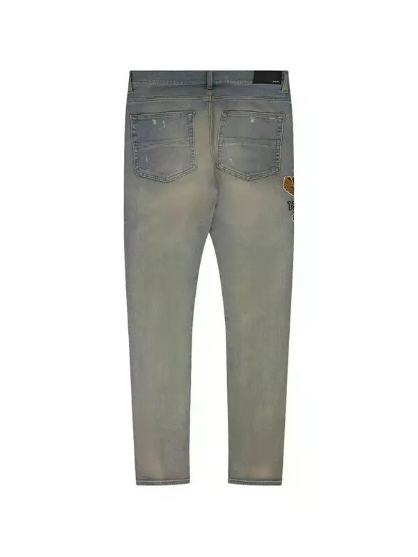 Amiri Varsity Eagle Logo-patch Jeans