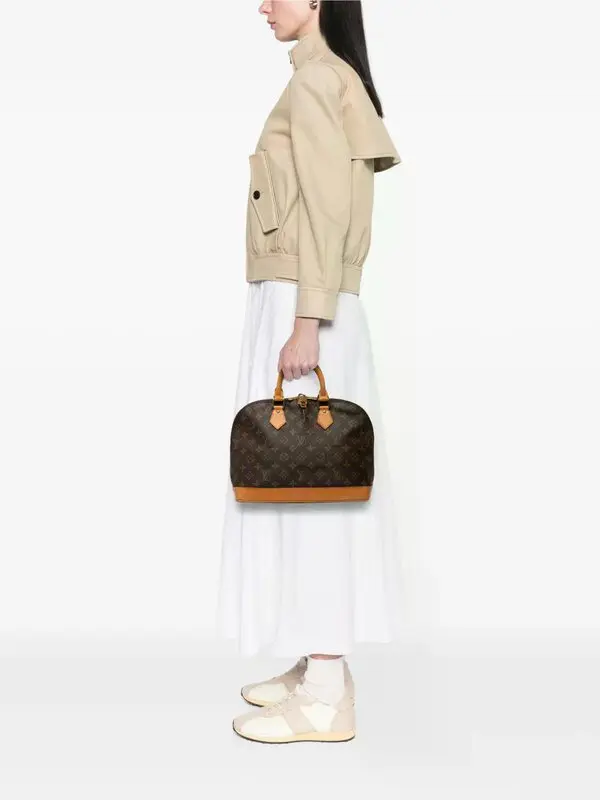 LOUIS VUITTON 1997 Monogram Alma Pm Handbag