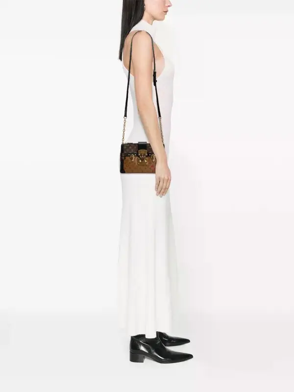 LOUIS VUITTON 2021-2025 Monogram Reverse Trunk Clutch Crossbody Bag - Black