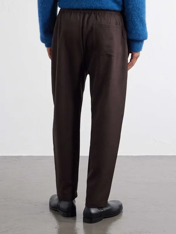 A KIND OF GUISE Banasa Tapered Wool Trousers
