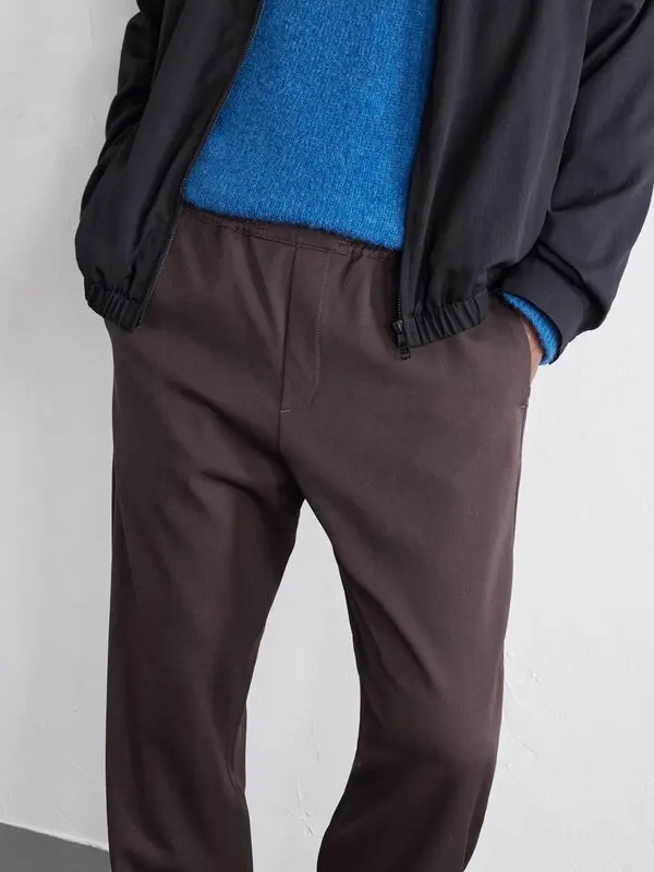 A KIND OF GUISE Banasa Tapered Wool Trousers