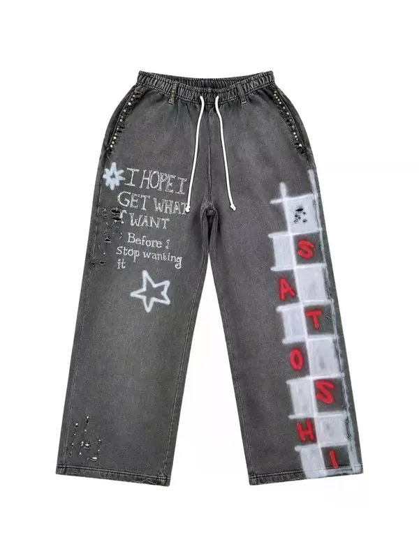 SATOSHI NAKAMOTO Get What I Want Distressed Graffiti-print Trousers - Grey