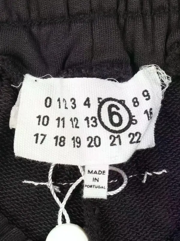 MAISON MARGIELA 2010s Newspaper-print Track Pants