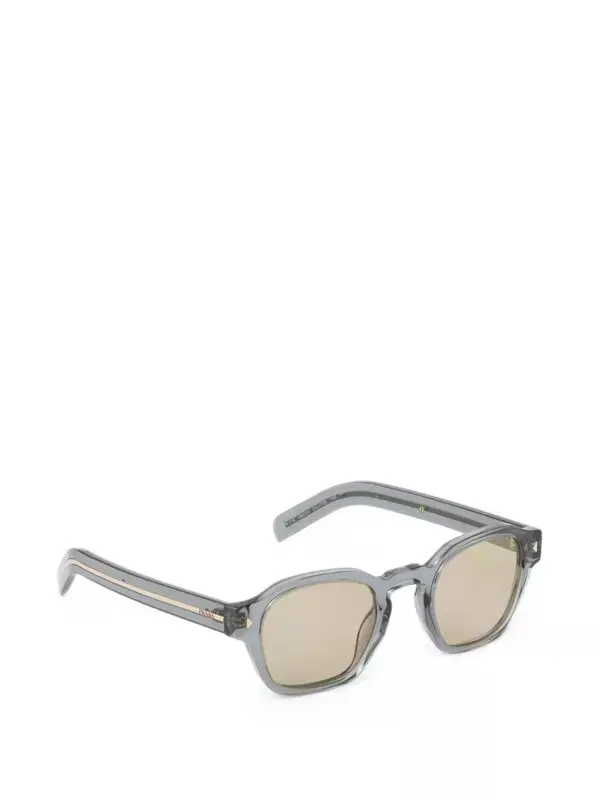 Prada Sunglasses With The Iconic Metal Plaque