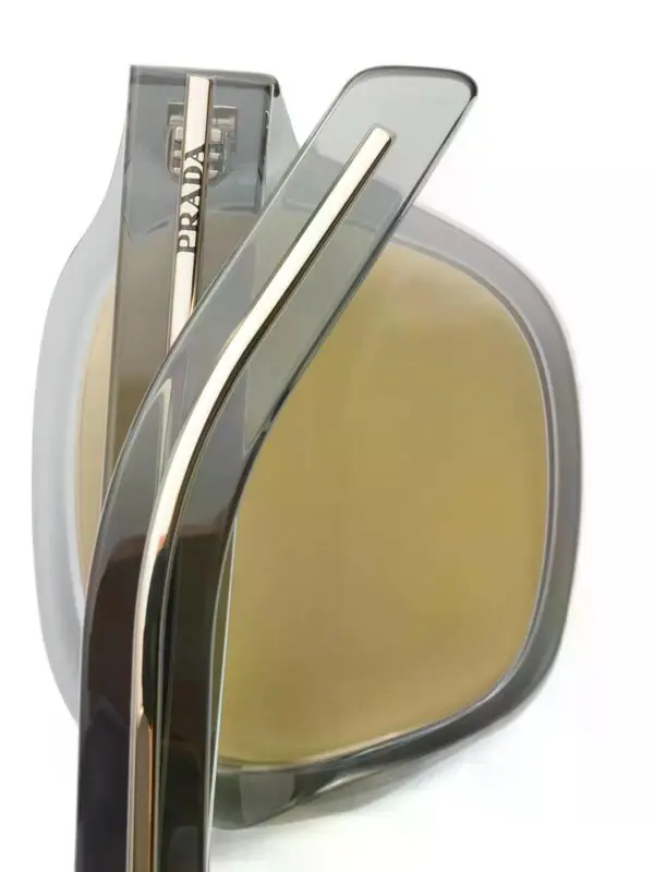 Prada Sunglasses With The Iconic Metal Plaque