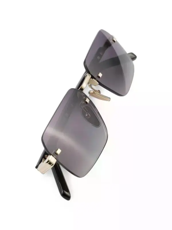 Prada Sunglasses With The Iconic Metal Plaque