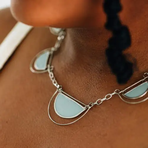 TEN THOUSAND VILLAGES Half Moon Capiz Necklace