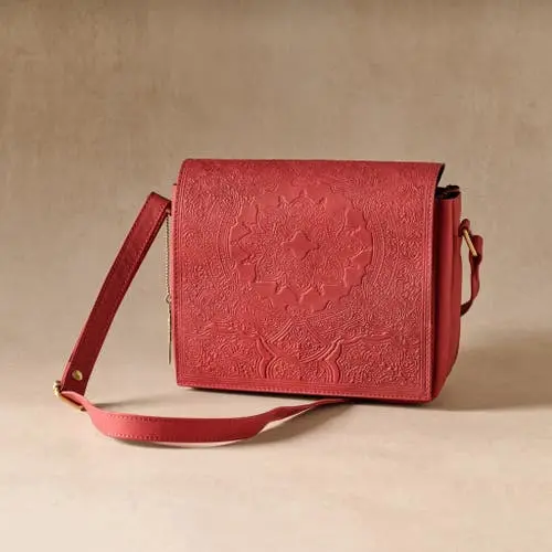 TEN THOUSAND VILLAGES Kohra Embossed Leather Crossbody Bag