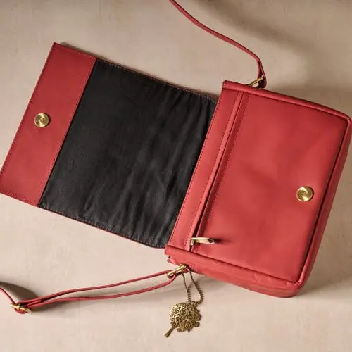 TEN THOUSAND VILLAGES Kohra Embossed Leather Crossbody Bag