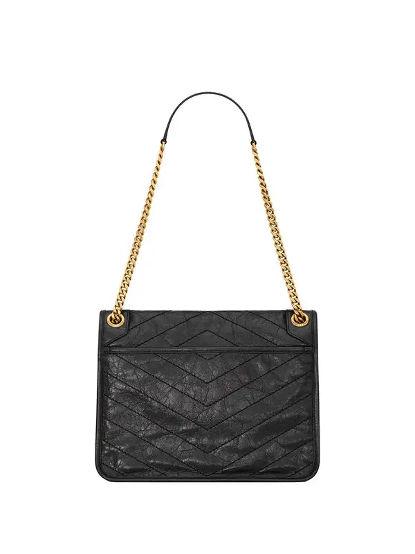 Saint Laurent Niki Medium Soft Bag In Vintage Leather - Black