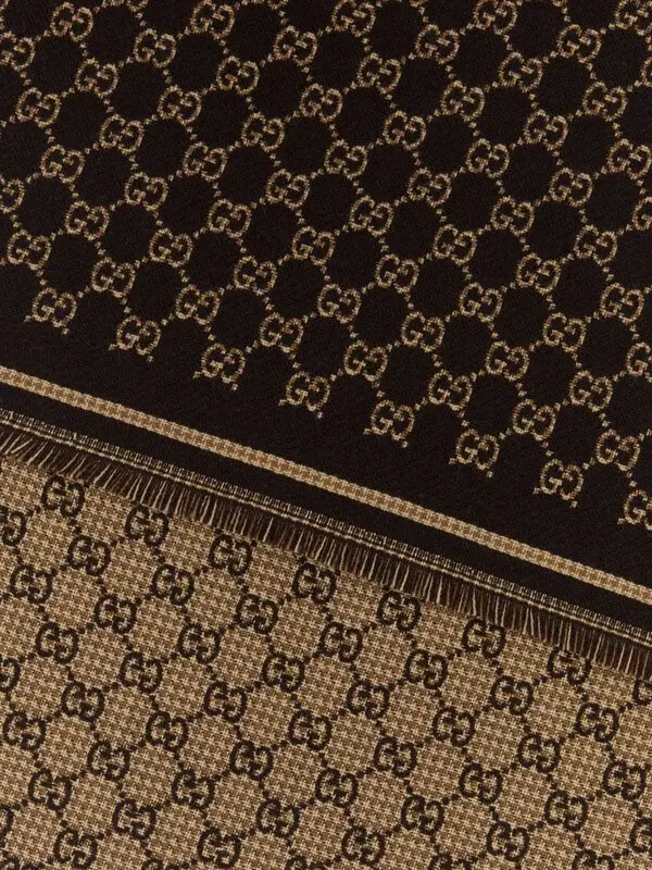 Gucci All-over Gg Motif Wool Scarf With Fringed Edges - Brown