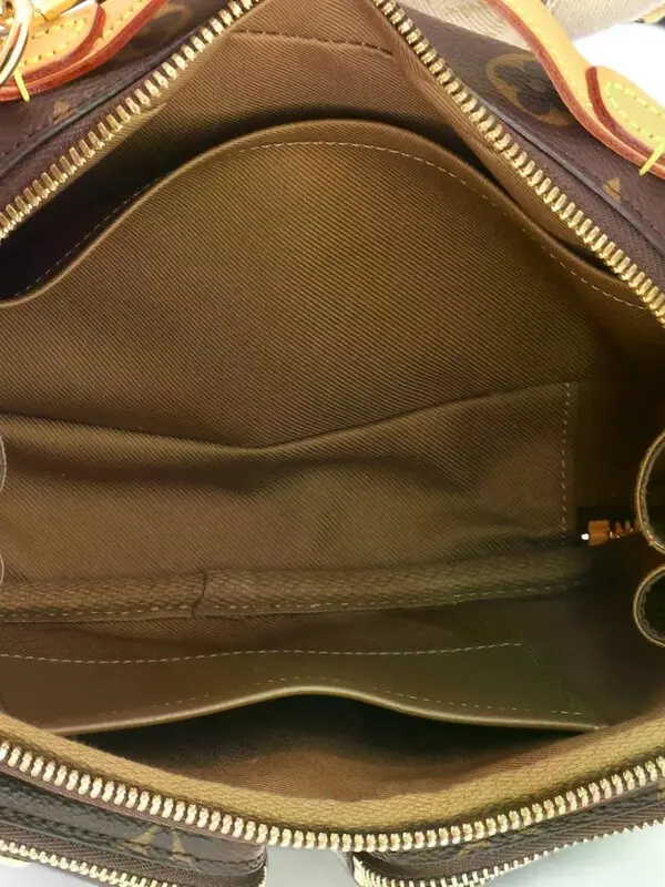 LOUIS VUITTON Utility Monogram Canvas Crossbody Bag