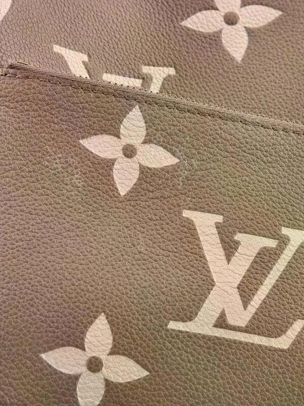 LOUIS VUITTON Monogram Empreinte Giant Mm Bucket Bag