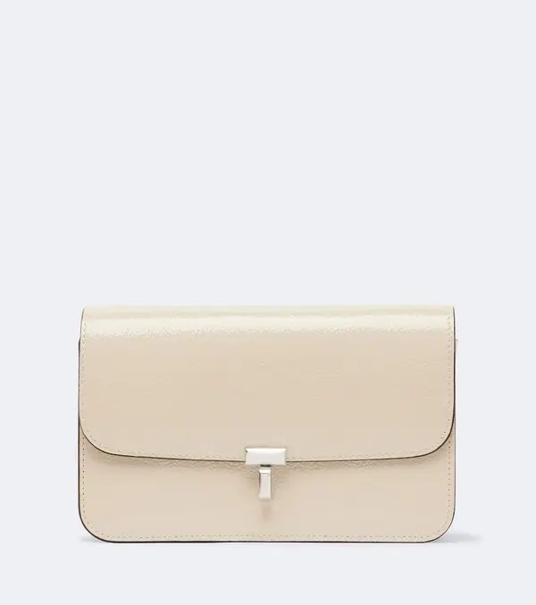 TOTEME T-lock Patent Leather Crossbody Bag - White