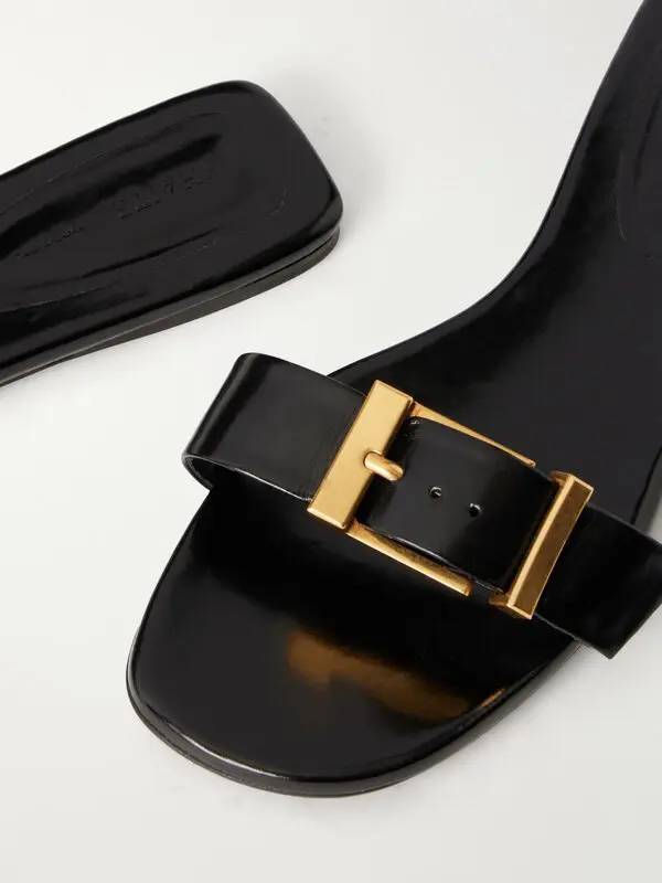 Khaite Patent Leather Slide Sandals With Gold Buckle