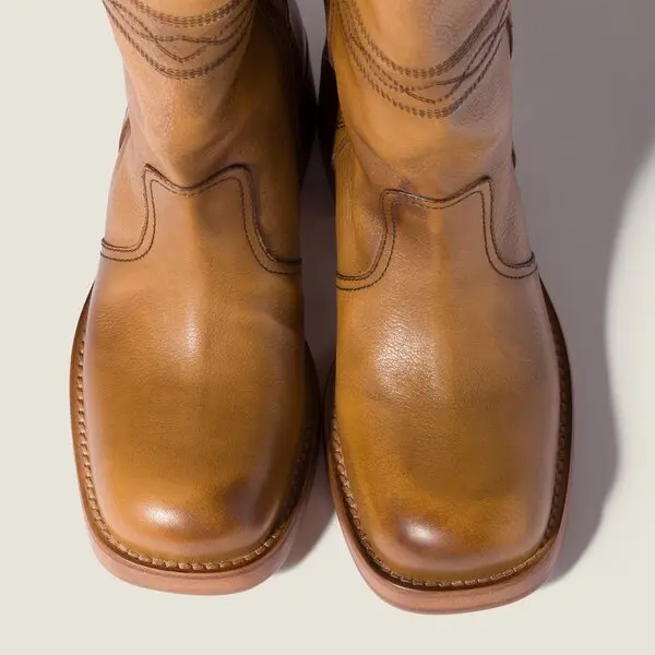 Miu Miu Knee-high Embossed Leather Boots