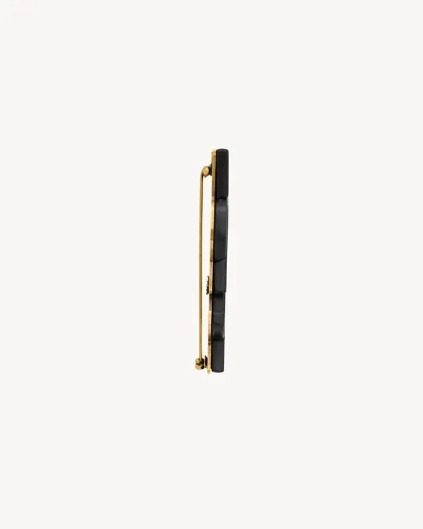 Saint Laurent Cassandre Brooch In Leather