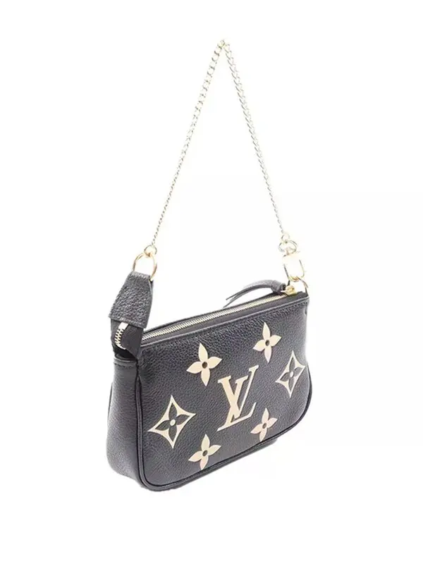 LOUIS VUITTON 2021-2026 Bicolor Monogram Empreinte Mini Pochette Accessoires Handbag