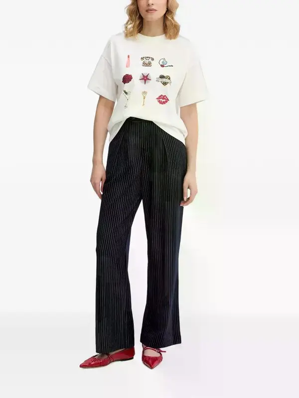 NEVER FULLY DRESSED Graphic Print T-shirt