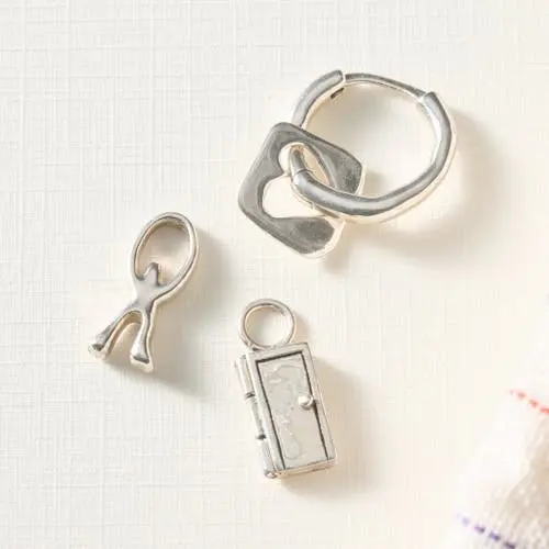 TEN THOUSAND VILLAGES Sterling Heart Charm Pendant