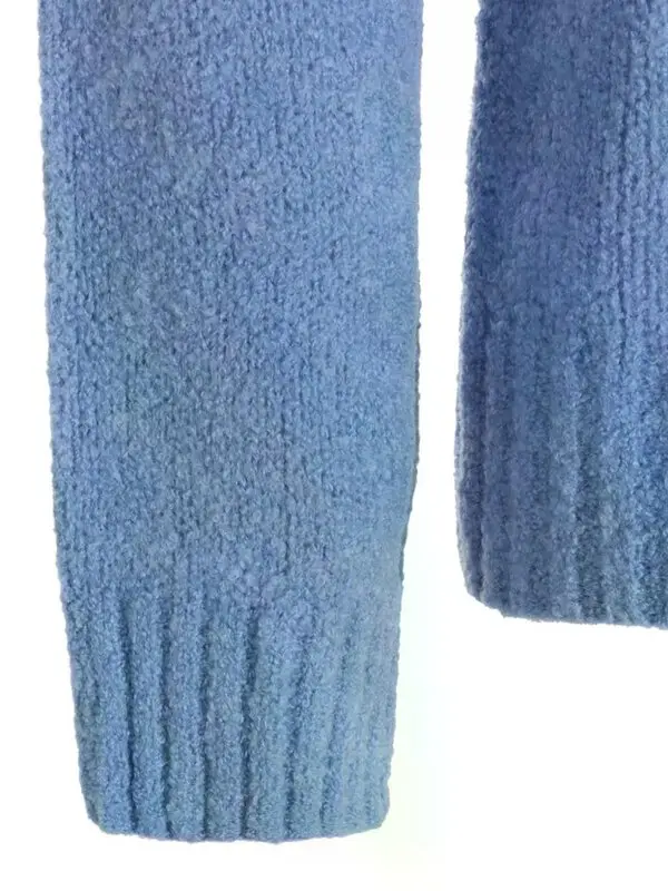 04651 / A TRIP IN A BAG Crew-neck Bouclé Sweater