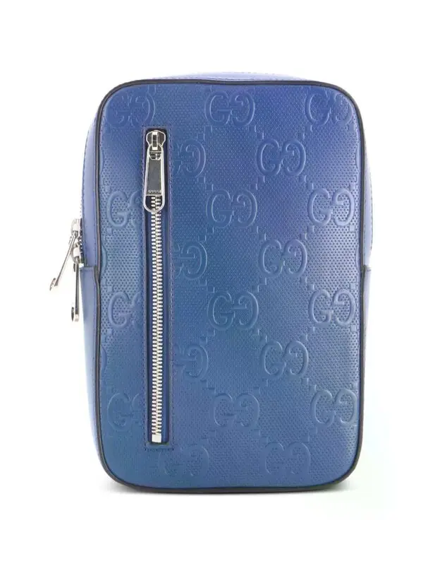 Gucci Gg Embossed Perforated Leather Sling Backpack - Blue