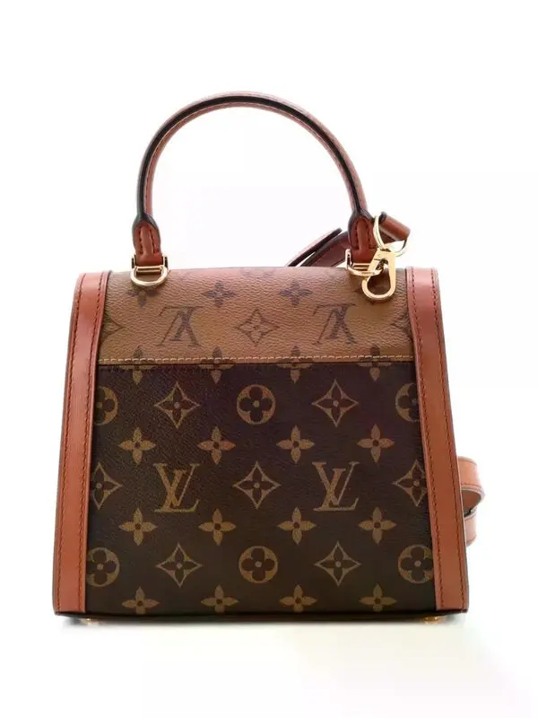 LOUIS VUITTON Dauphine Capitale Shoulder Bag In Reverse Monogram Canvas - Brown