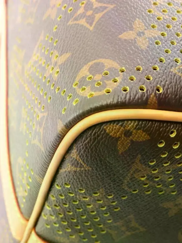 LOUIS VUITTON 2021s Keepall Bandoulière 50 Monogram Perforated Handbag