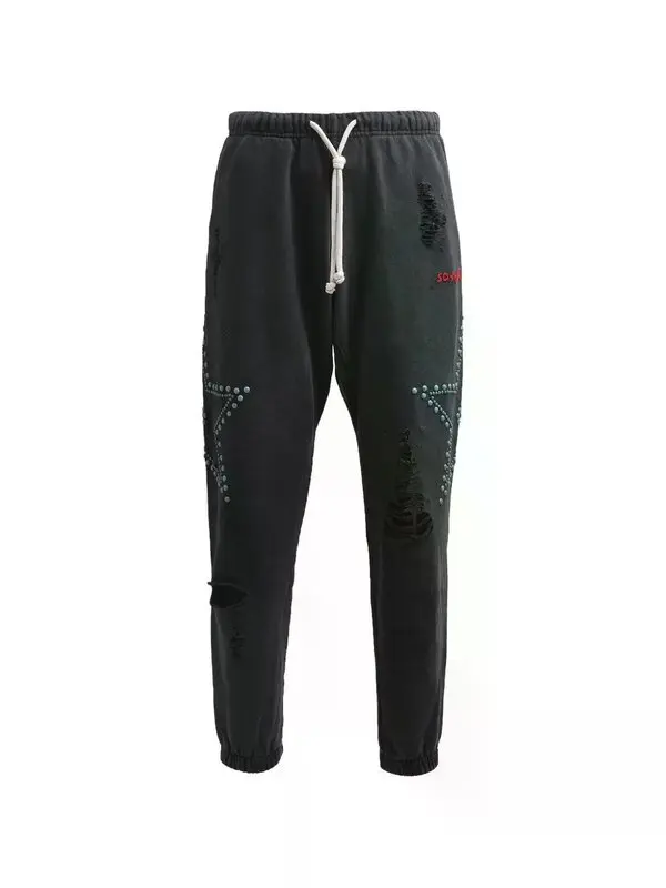 SATOSHI NAKAMOTO Distressed Star-studded Track Pants - Black