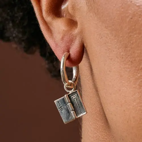 TEN THOUSAND VILLAGES Sterling Hinged Door Charm