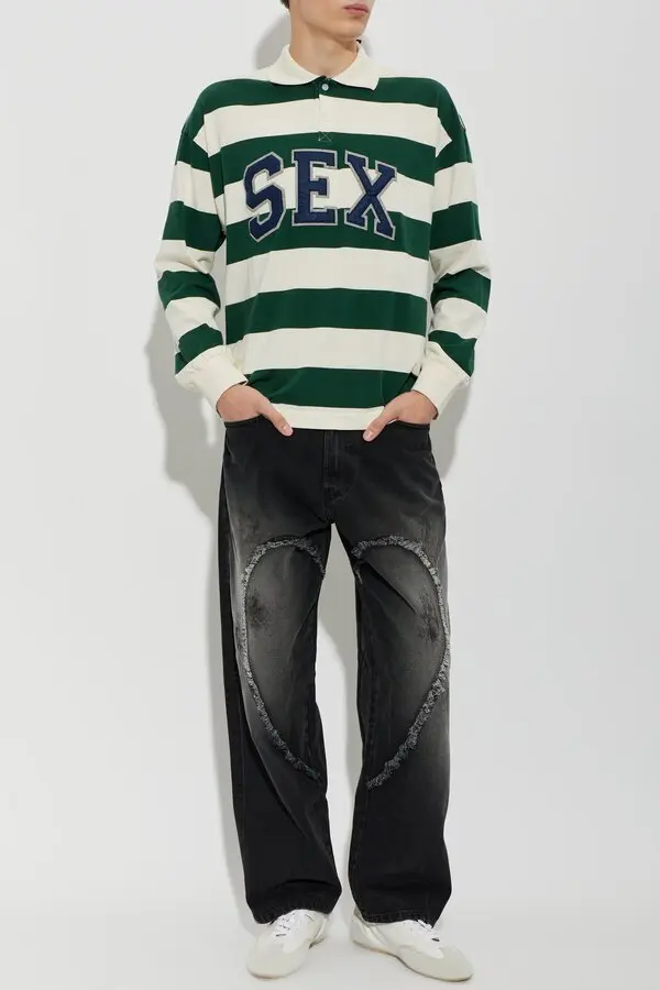 CARNE BOLLENTE Vintage Effect Jeans With Distressed Heart Detail