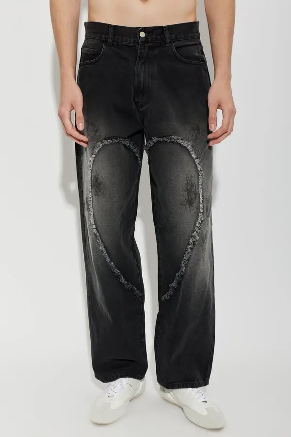 CARNE BOLLENTE Vintage Effect Jeans With Distressed Heart Detail